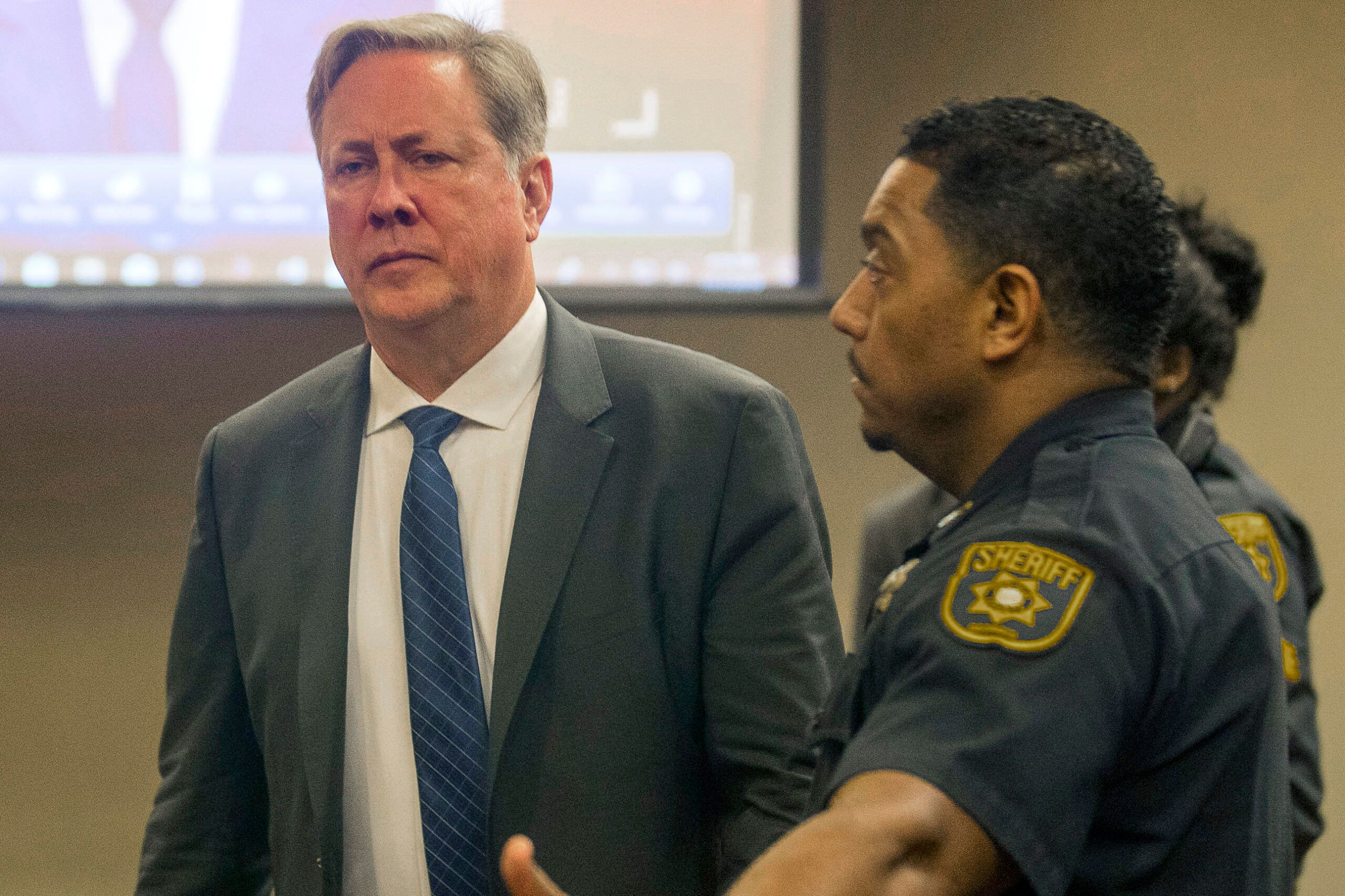 Court overturns convictions of officer who killed naked, Black Air ...