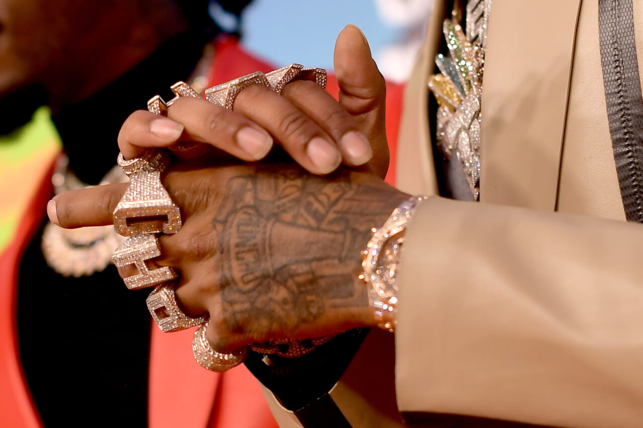 Fan goes overboard and tattoos Offset and Quavo on forearms
