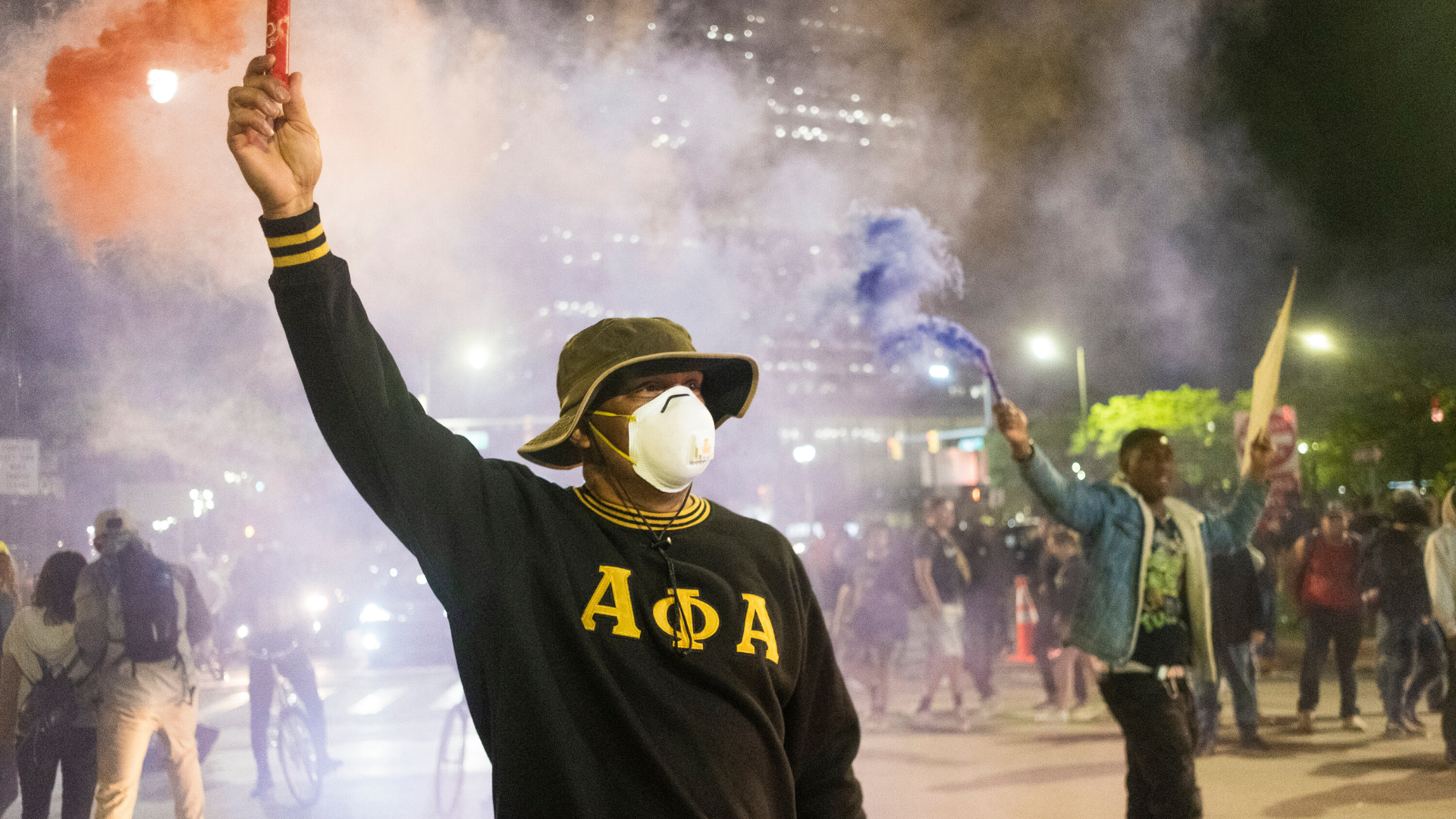 Detroit police officer drives SUV into crowd of protesters