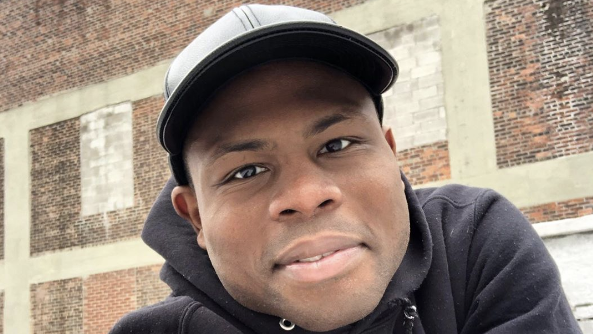 New York protester turns himself in the day after riot police swarm home