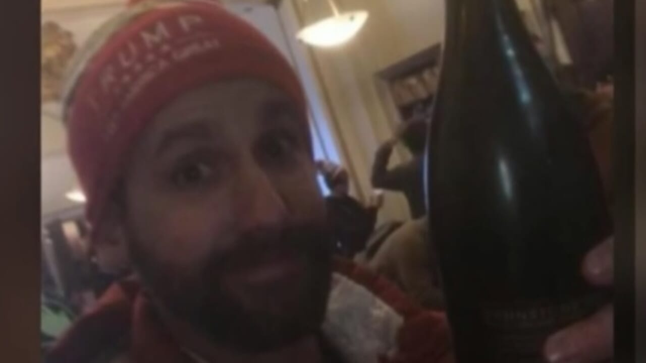 Capitol rioter who 'chugged' wine from Senate office is arrested - TheGrio