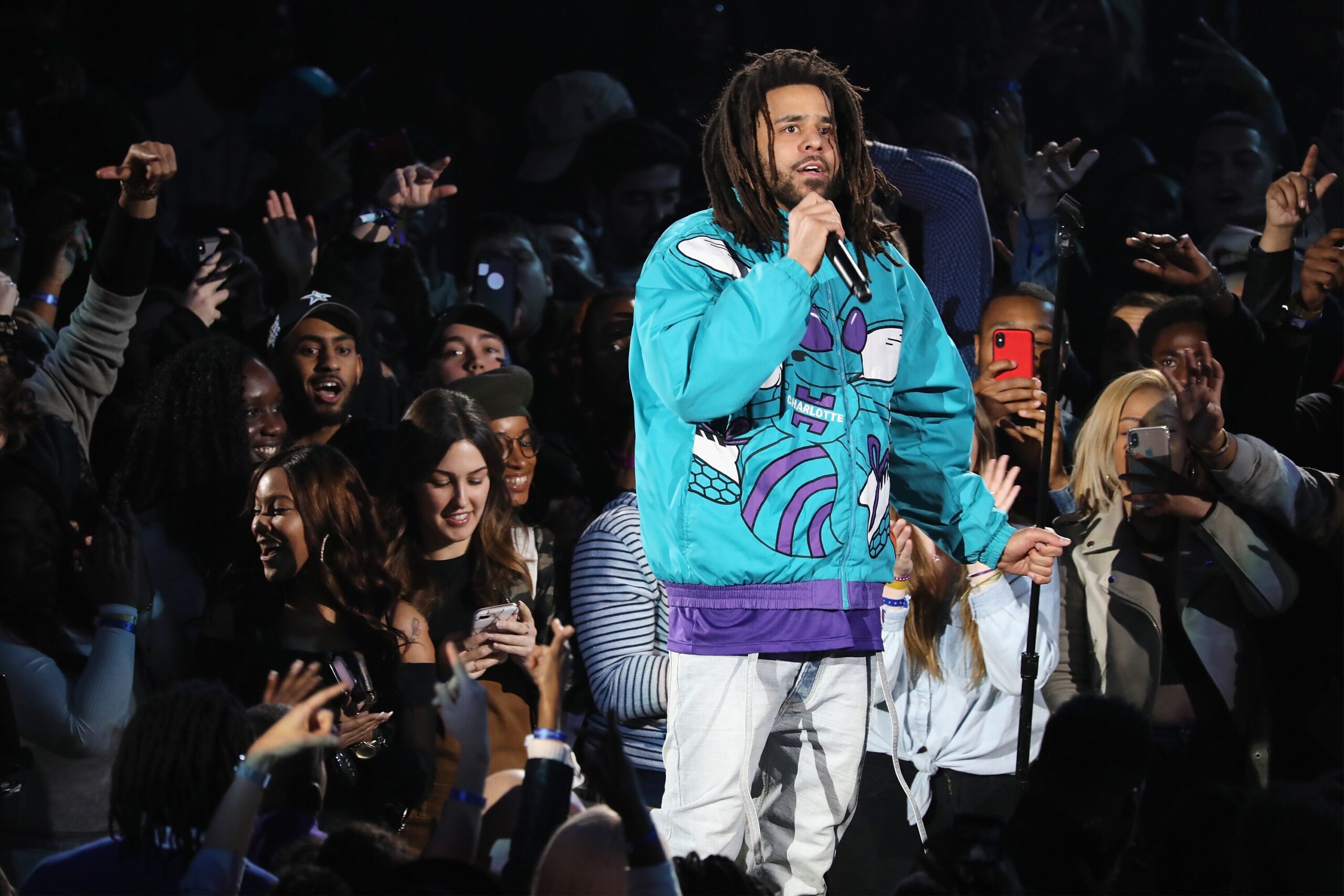 J. Cole walks the walk of activism and charity - TheGrio