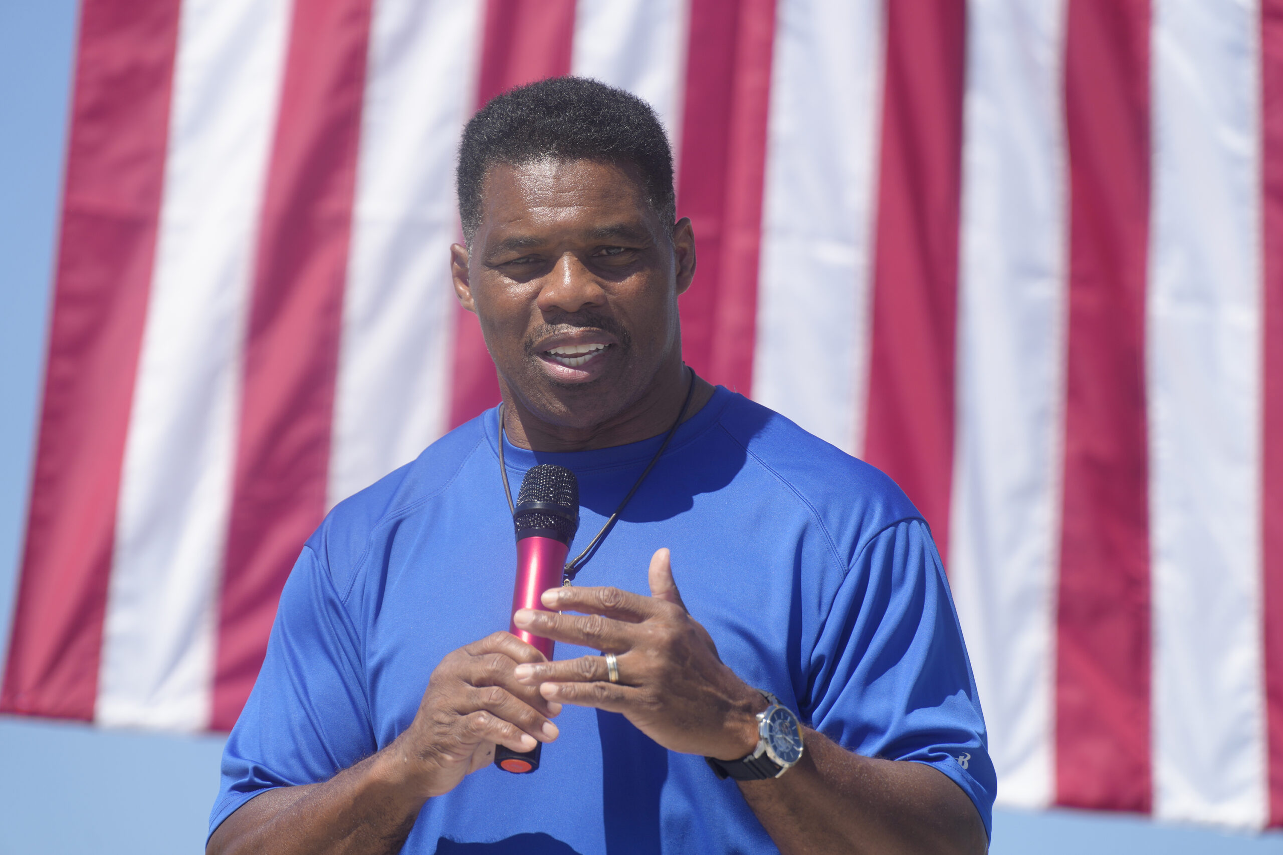 Herschel Walker, in highly contested race for Senate, sticks to ...