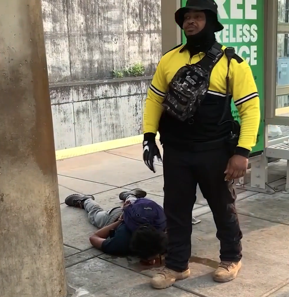 St. Louis security guard punches man lying on light rail platform