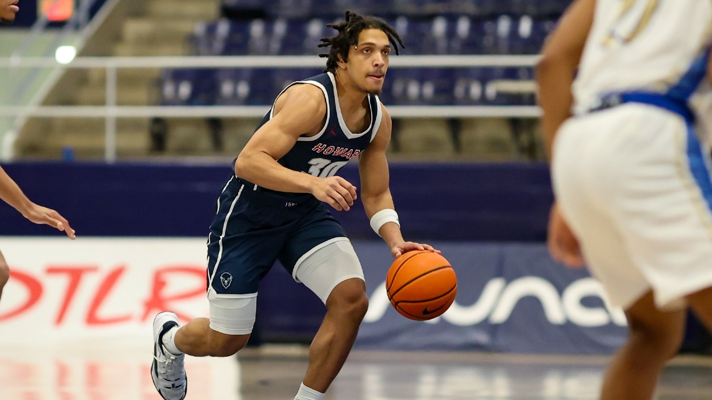 Howard basketball players shoot hoops while studying for a Ph.D. and ...
